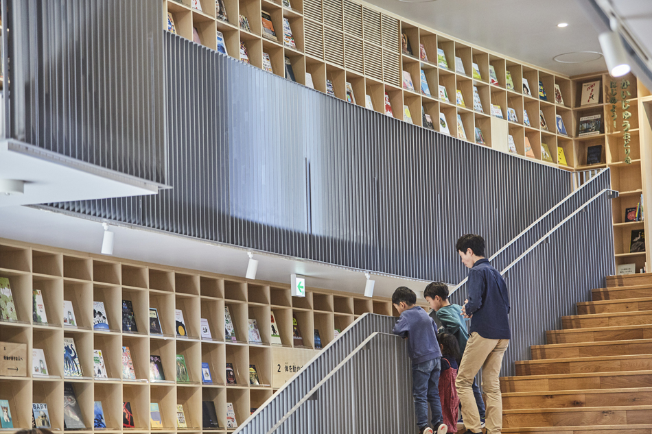 tadao ando completes nakanoshima children’s book forest in osaka