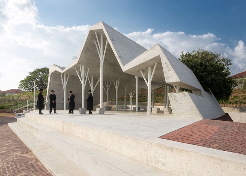 ron shenkin places concrete folded canopy over cemetery pavilion in israel