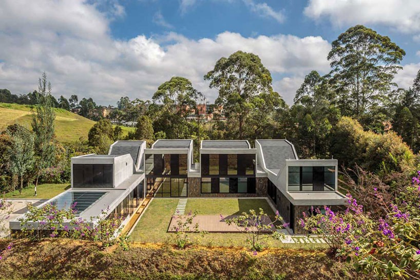 plan:b organizes colombian house as four connected concrete volumes
