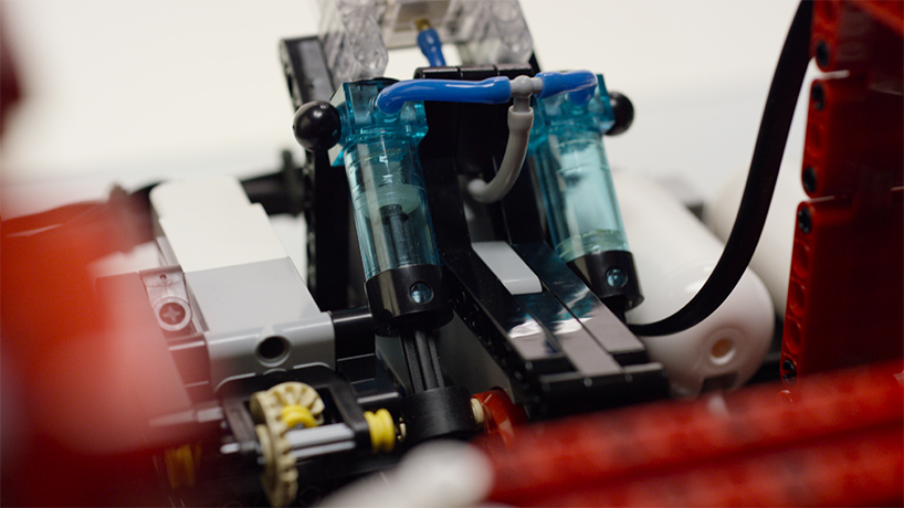 Handmade LEGO Robot Folds Launches Paper Planes To Perfection