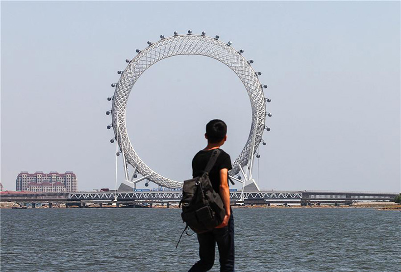 the world’s largest spokeless ferris wheel opens in shandong, china
