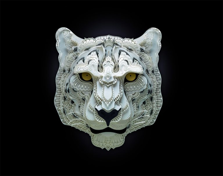 patrick cabral's intricate papercuts raise awareness for vulnerable species