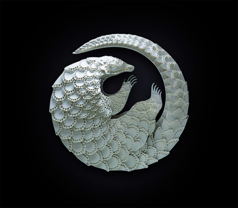 patrick cabral's intricate papercuts raise awareness for vulnerable species