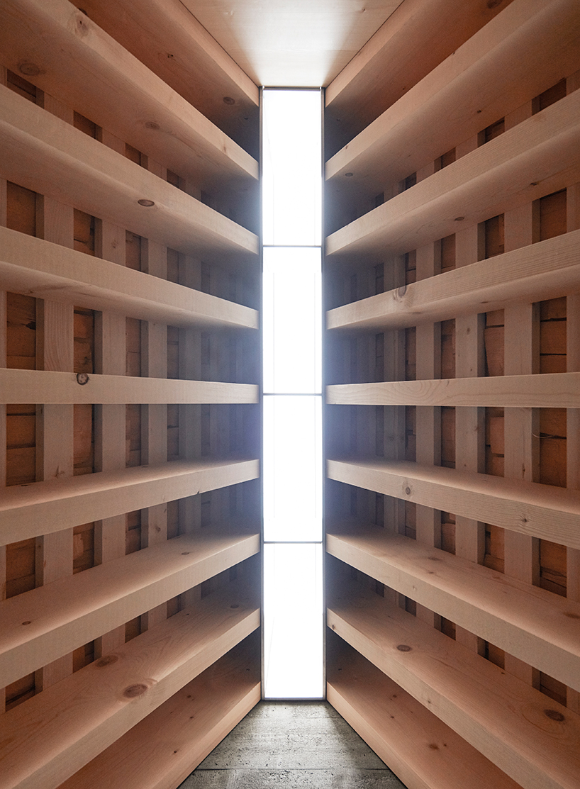 innauer matt's tiny alpine chapel perches along scenic austrian meadow