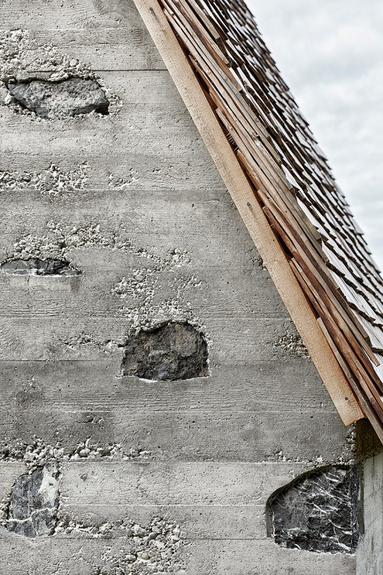 innauer matt's tiny alpine chapel perches along scenic austrian meadow