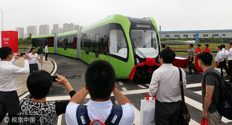 china unveils driverless train that follows painted tracks instead of rails