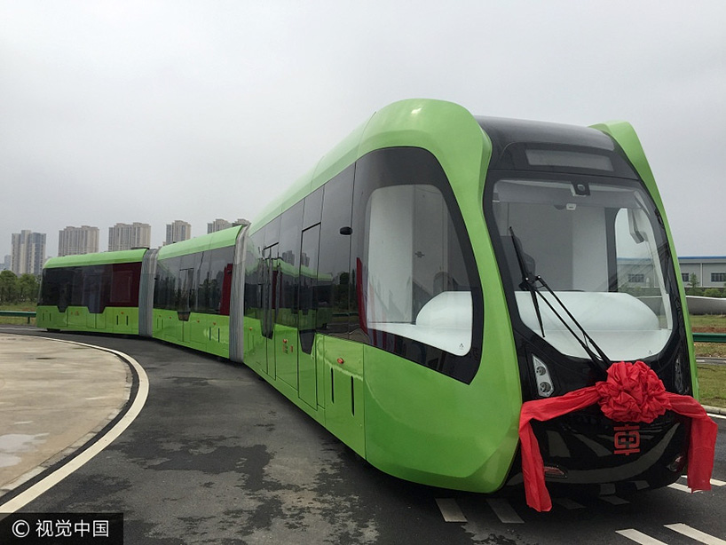 china unveils driverless train that follows painted tracks instead of rails