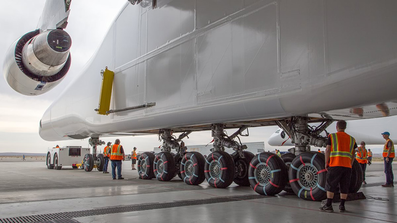 the stratolaunch, world's largest plane, emerges from hangar for first time