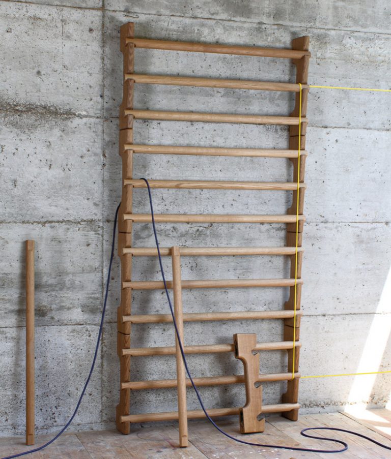 work out in style with atelier oraviva's solid oak wall bar