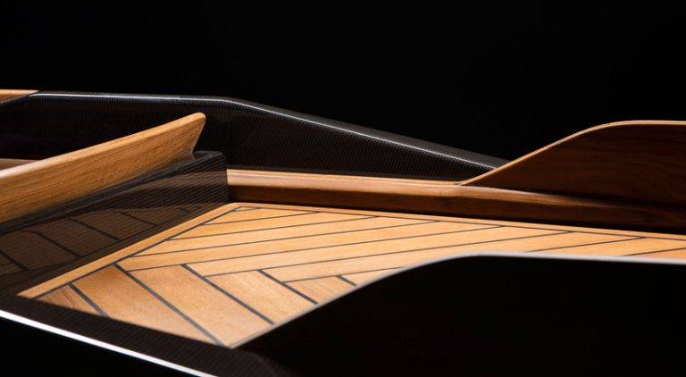 monocoque paddle canoe is crafted of copper-woven carbon fiber ...