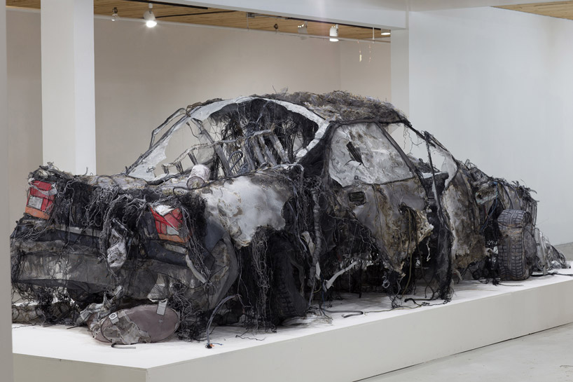 this full-scale demolished car is constructed from ghost-like textiles ...