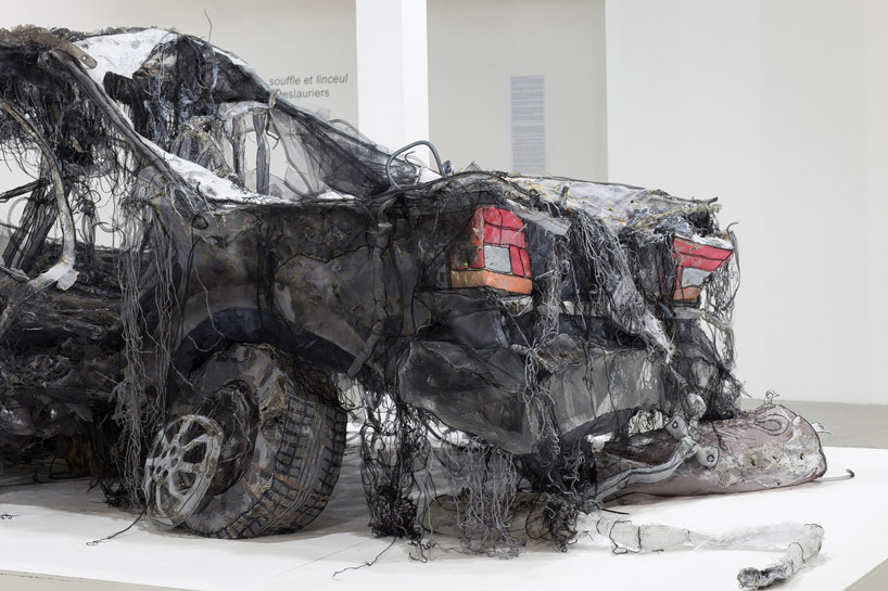 this full-scale demolished car is constructed from ghost-like textiles ...