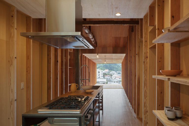 OFEA renovates a house in japan with an insulated timber corridor