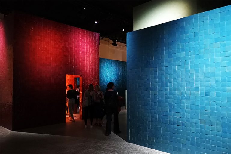 hermès presents new home collections within colorful, tile-clad chambers