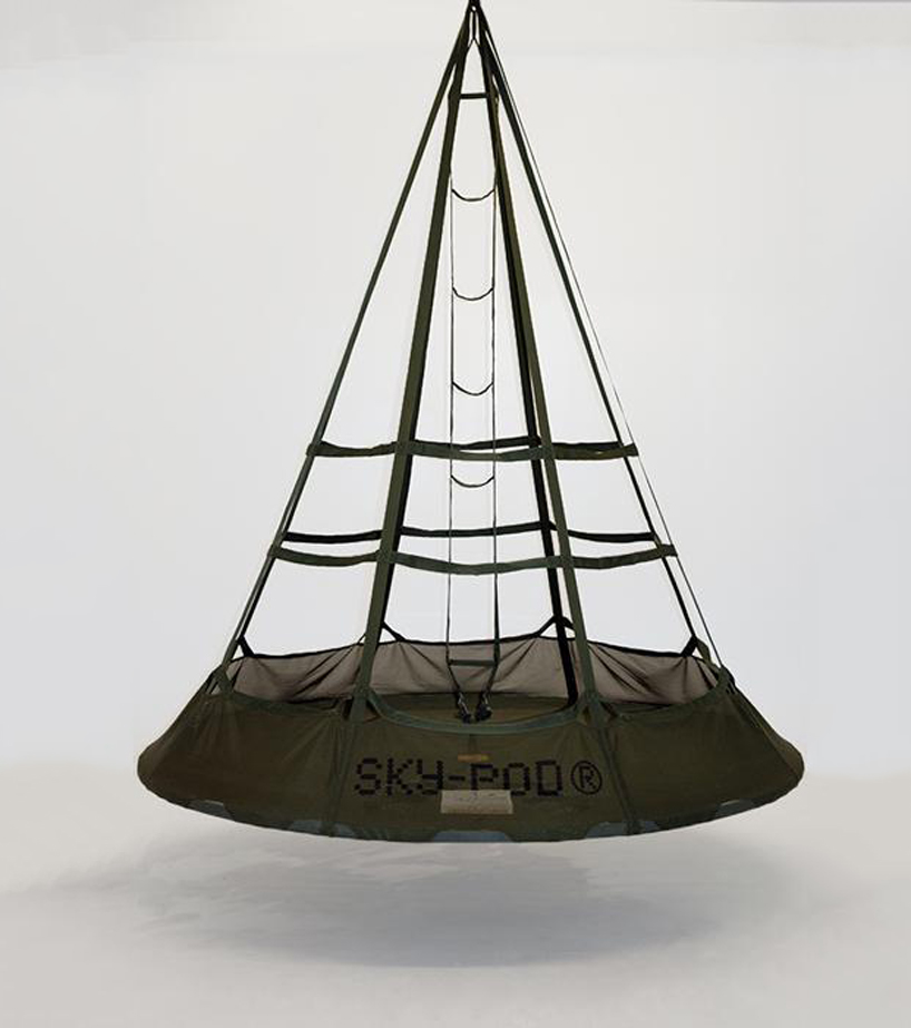 sky-pod, a spiderweb-like tent to hang in the woods