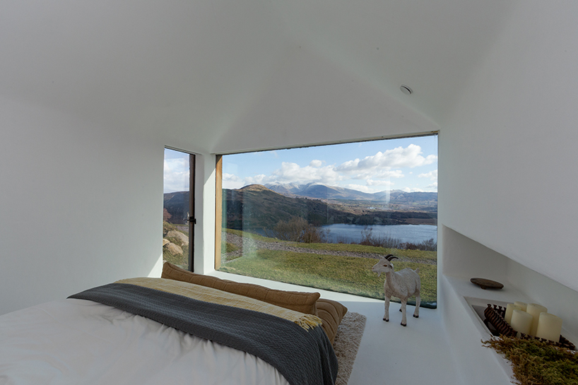 urban agency's rustic house is sheds covered with rusted metal