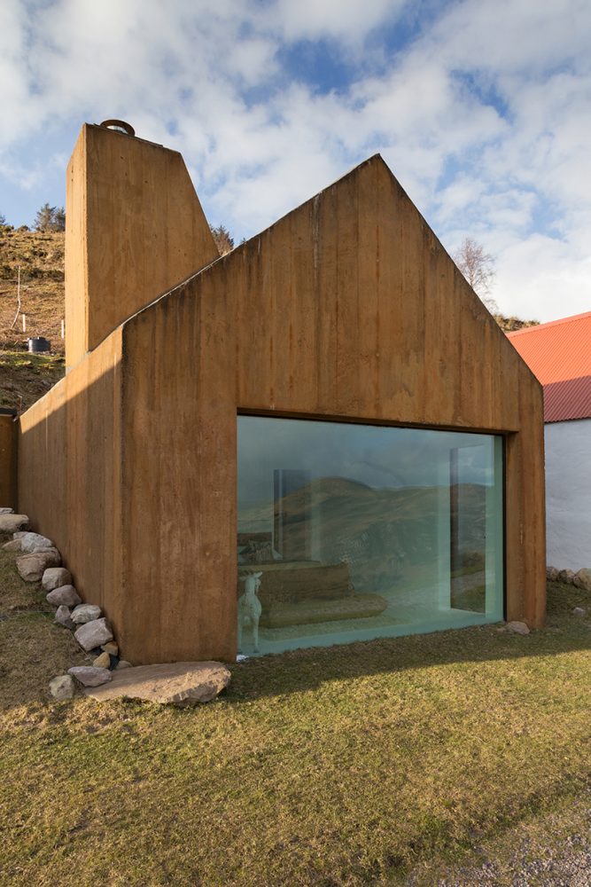 urban agency's rustic house is sheds covered with rusted metal