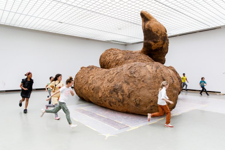 gelitin invites visitors to walk around giant turds in latest ...