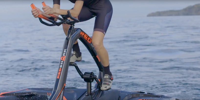 red shark bikes pedal-powered trimaran allow cyclists to bike on water