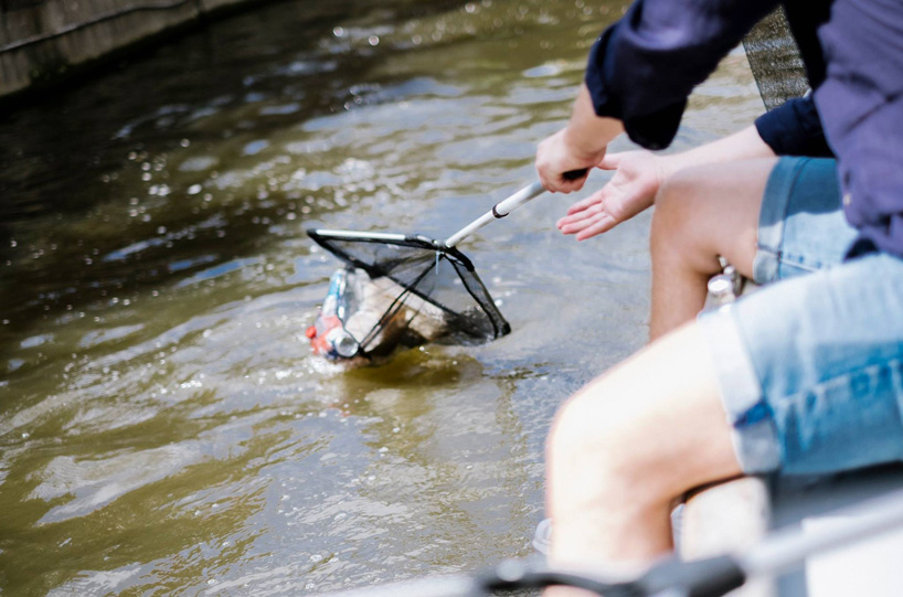 amsterdam tourists can combine sightseeing with plastic fishing on the ...