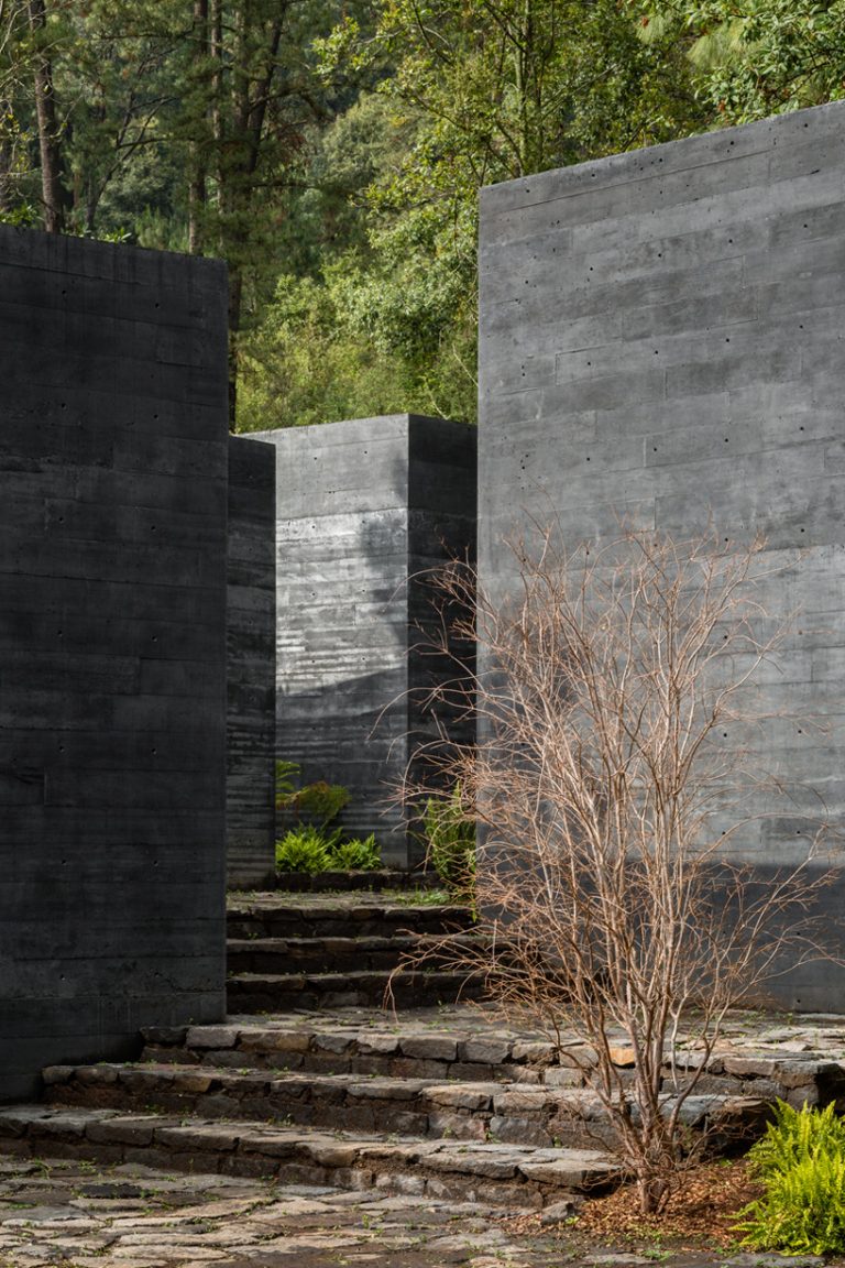 nine individual blocks compose the black concrete bruma house in mexico ...