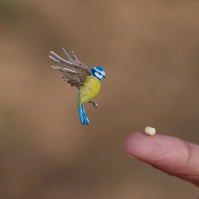 artists embark on 365 day series of intricately paper cut miniature birds