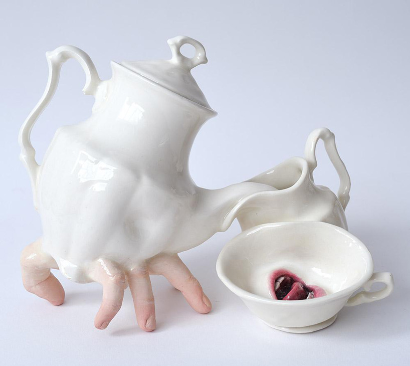 human body parts emerge from ronit baranga 's hybrid ceramic tableware