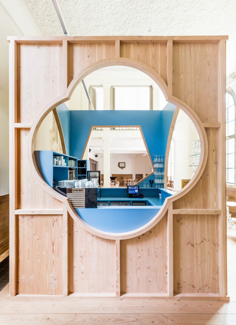 a contemporary gothic bar occupies belgium's largest cathedral