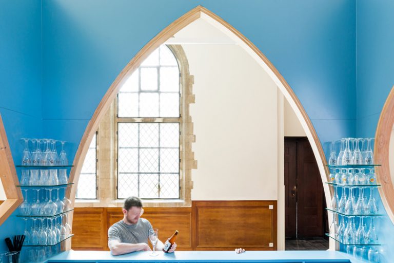 a contemporary gothic bar occupies belgium's largest cathedral