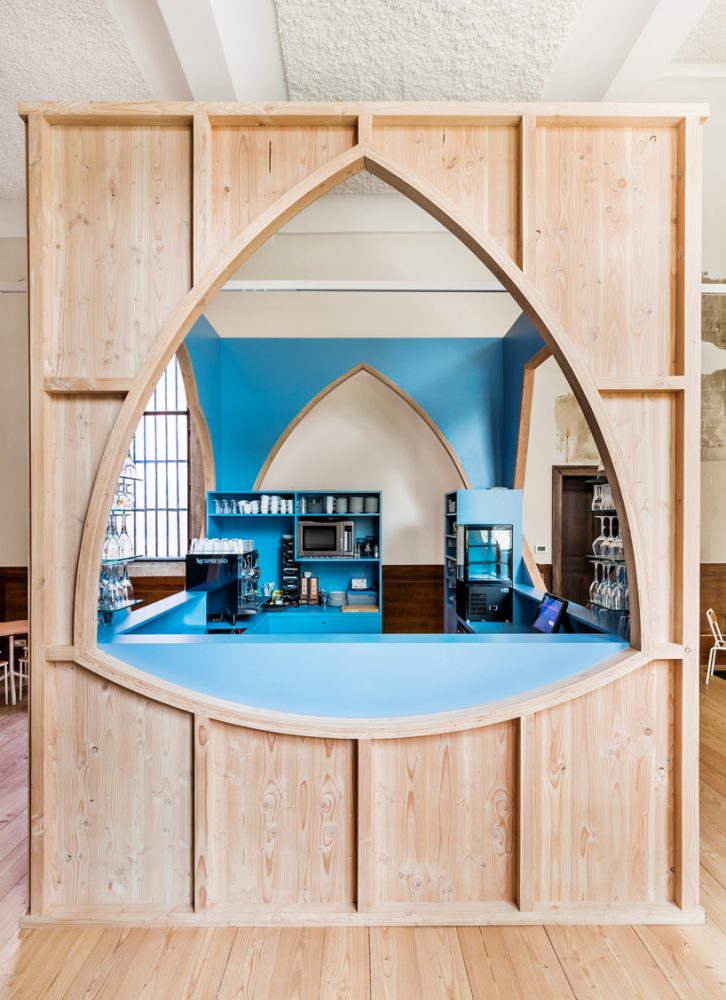 a contemporary gothic bar occupies belgium's largest cathedral