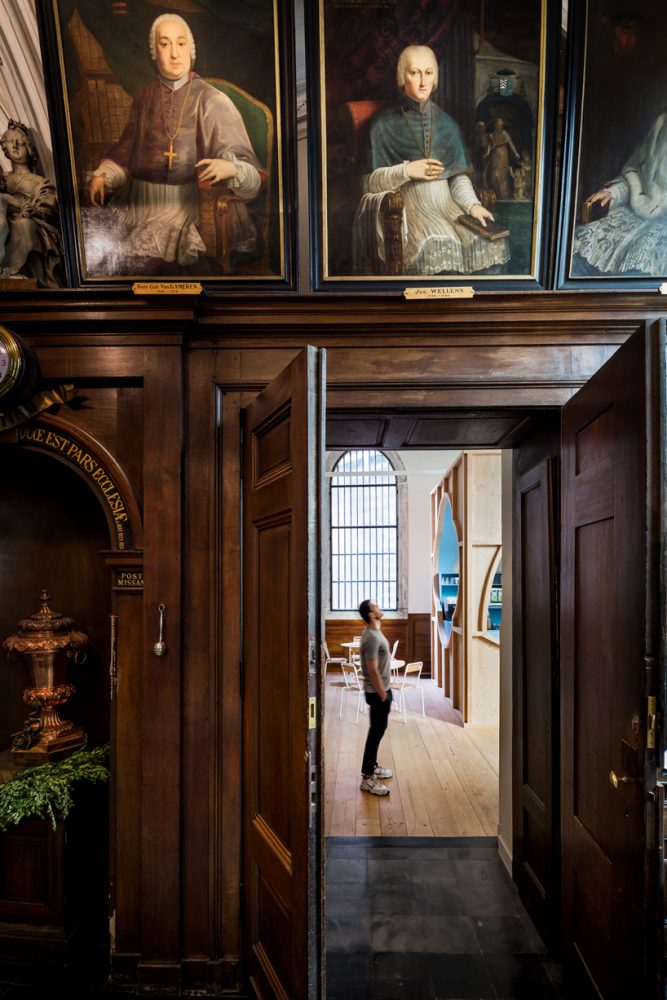 a contemporary gothic bar occupies belgium's largest cathedral