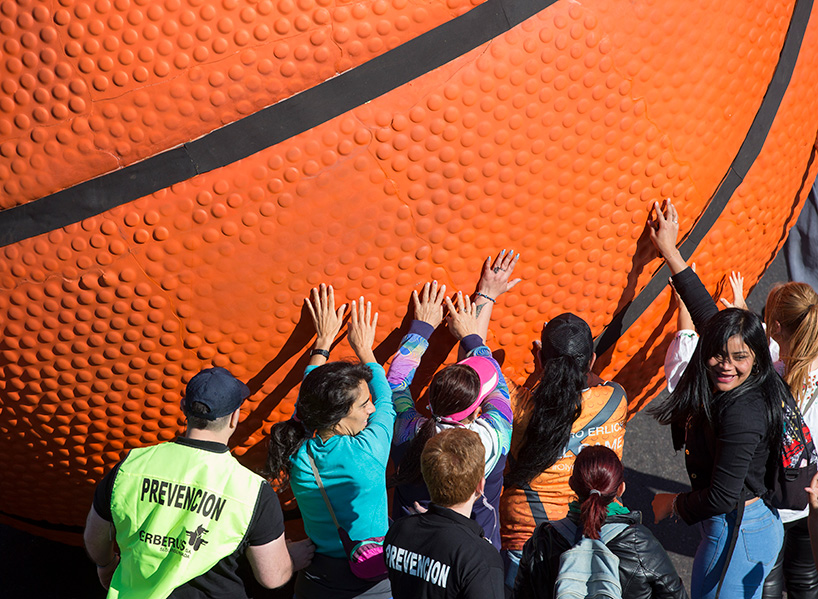 leandro erlich sets up large-scale ball parade in buenos aires