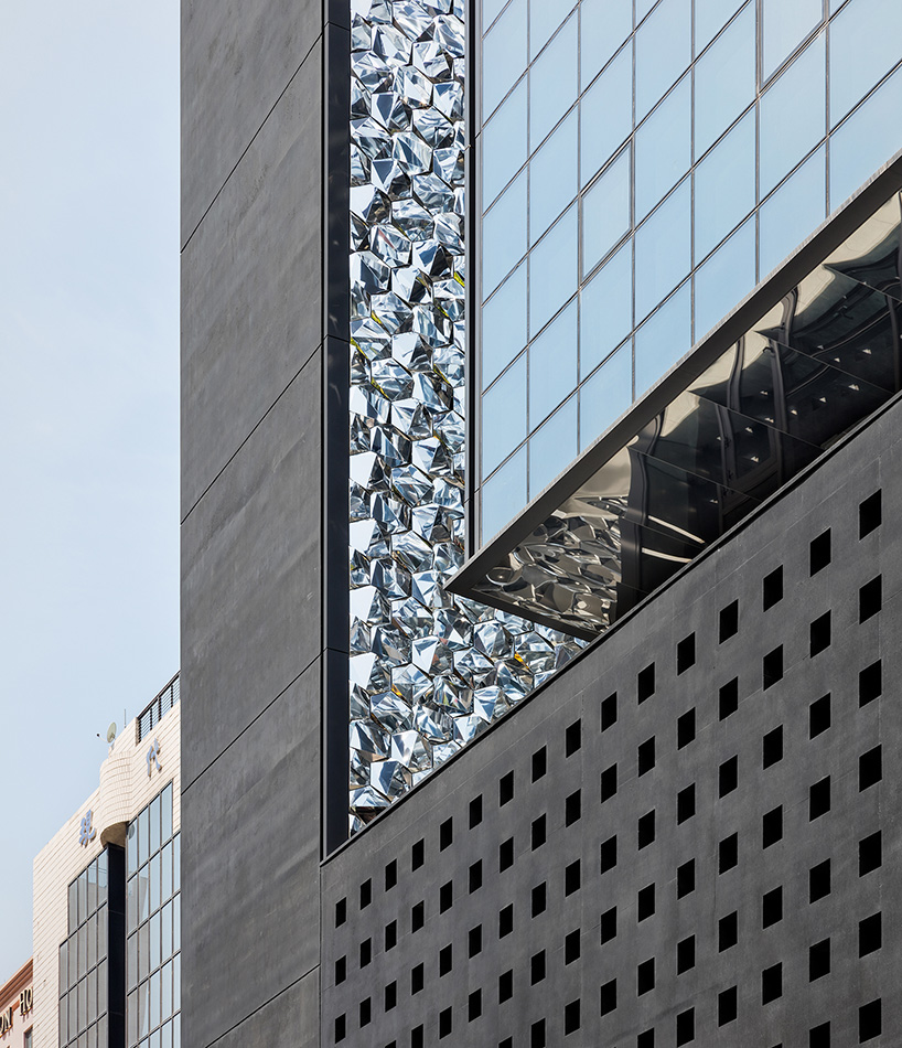 OBBA juxtaposes reflective panels with concrete for office tower in seoul