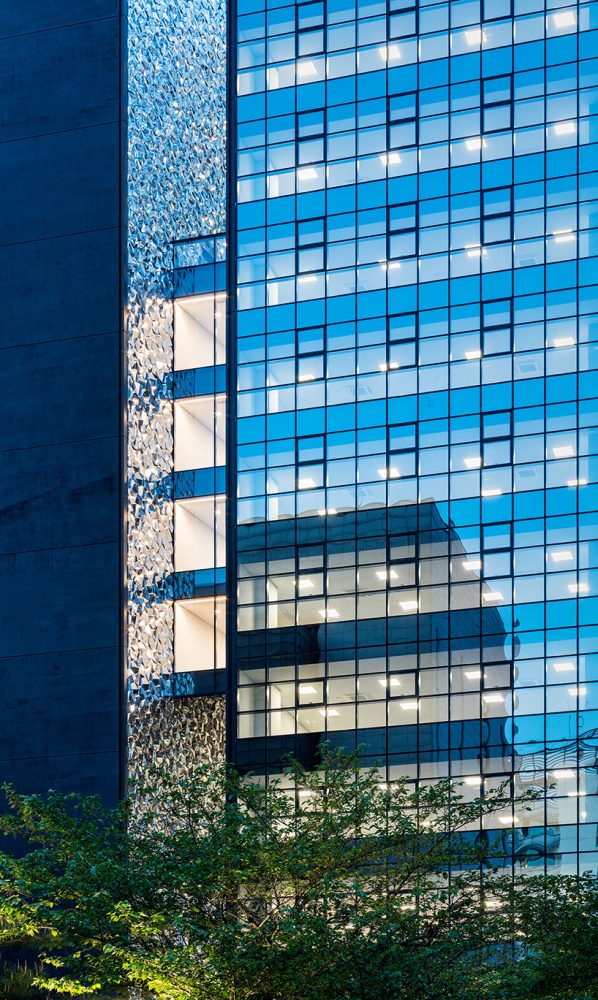 OBBA juxtaposes reflective panels with concrete for office tower in seoul