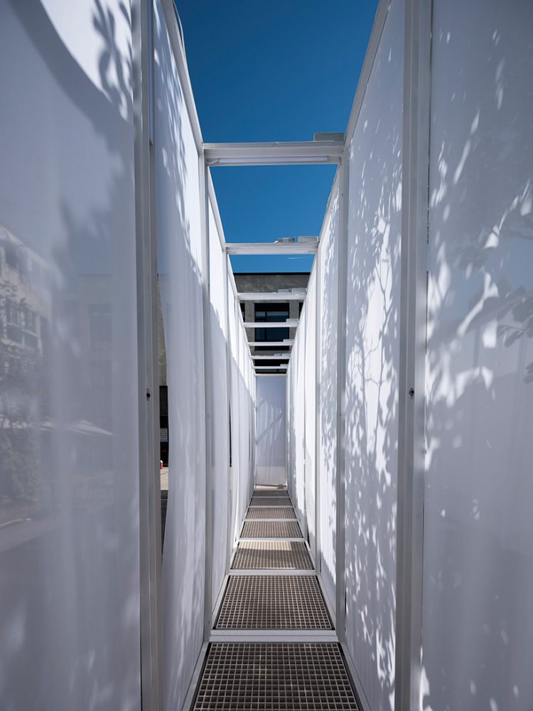 superimpose wraps beijing's CO2 pavilion in translucent screens + smoke