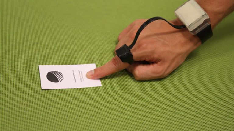 the fingerreader helps blind people read without braille