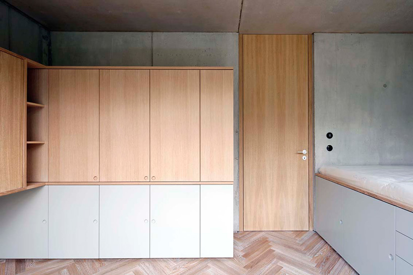 single-family house by 2001 juts like a concrete monolith from the ground