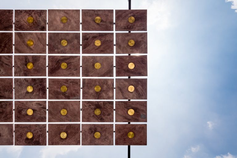 PALMA suspends grid of volcanic stone over mexico city terrace