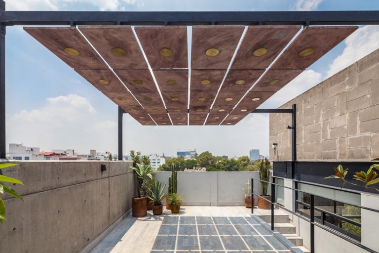 PALMA suspends grid of volcanic stone over mexico city terrace