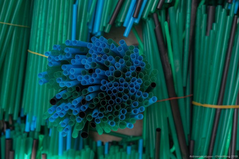 168,000 used straws were artfully repurposed into two crashing waves of ...