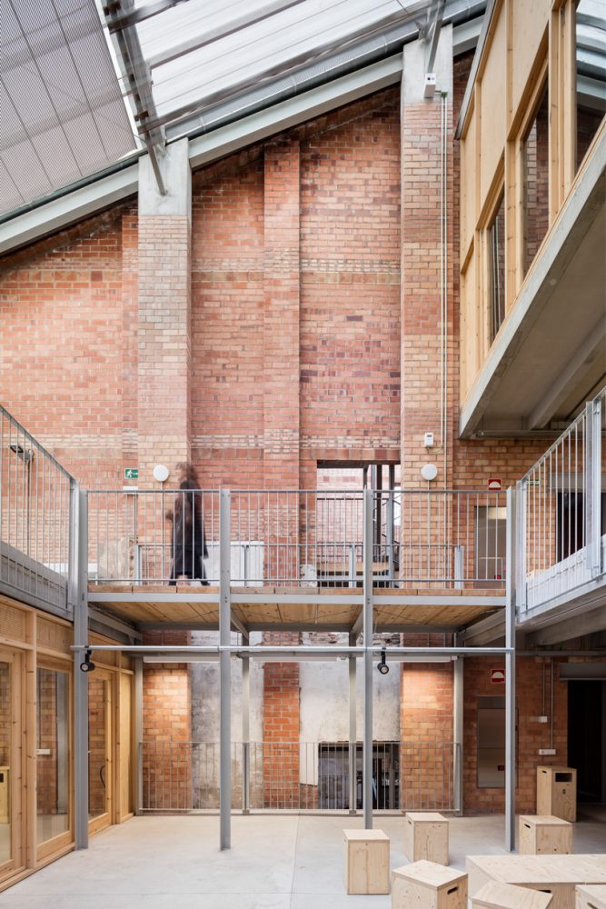 restoration by HARQUITECTES expresses heritage building's structural memory