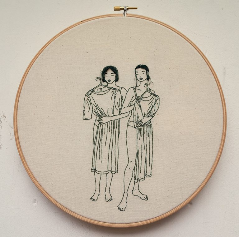 sheena liam, model and embroiderer, sculpts her hair with loose thread