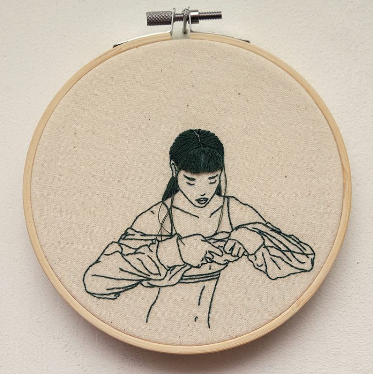 sheena liam, model and embroiderer, sculpts her hair with loose thread