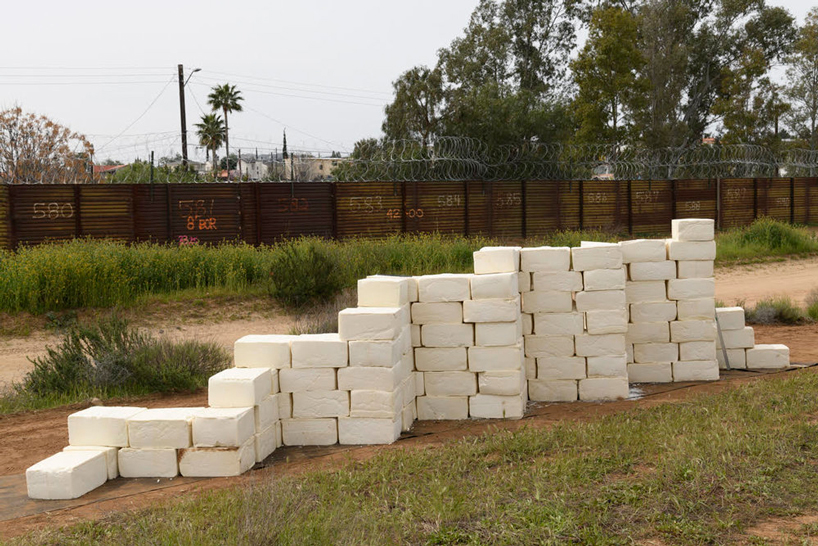 artist cosimo cavallaro is building a cotija cheese wall at the US ...