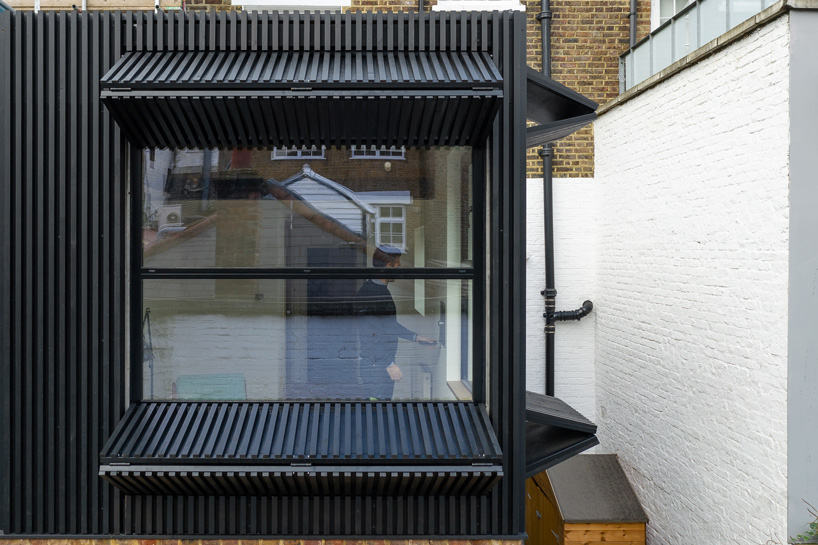 mata architects incorporates dynamic 'black box' extension into ...
