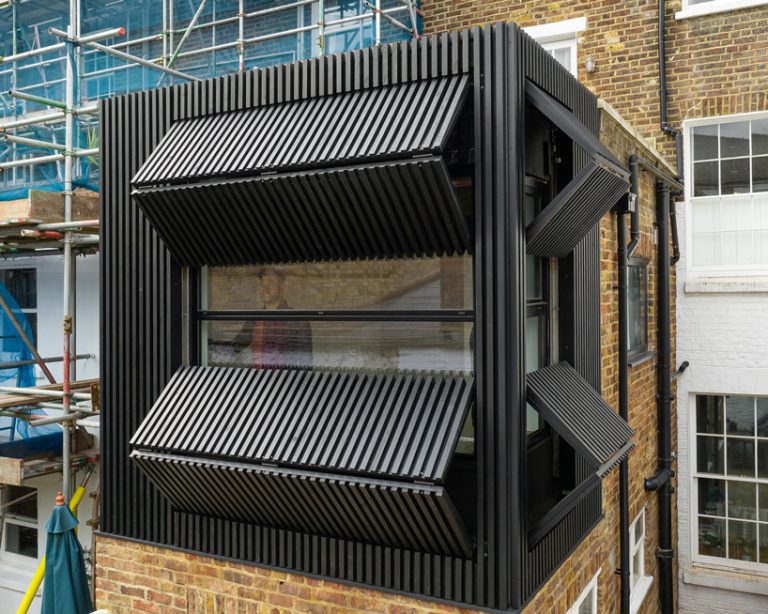mata architects incorporates dynamic 'black box' extension into ...
