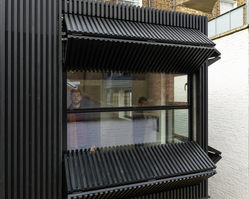 mata architects incorporates dynamic 'black box' extension into ...