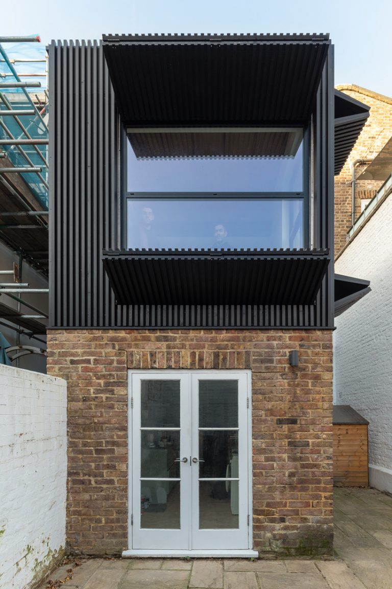 mata architects incorporates dynamic 'black box' extension into ...