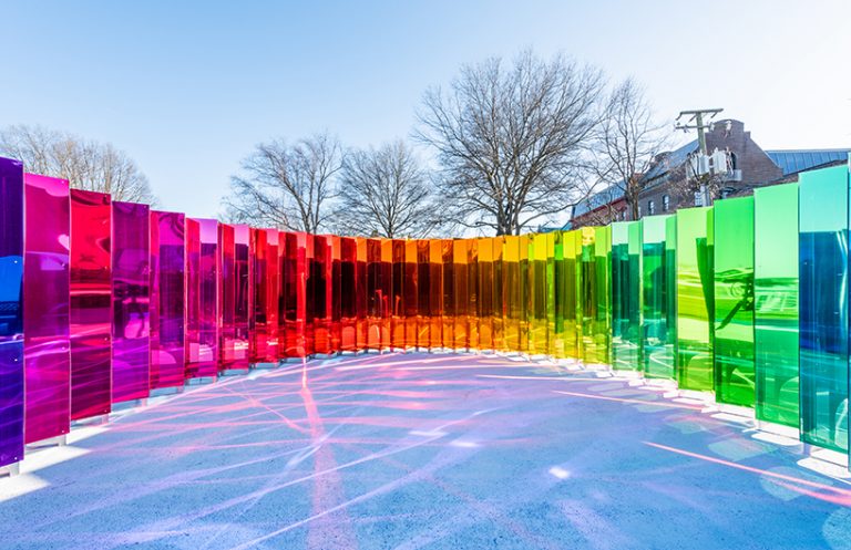new installation uses old lighthouse tech to beam prisms of colorful light