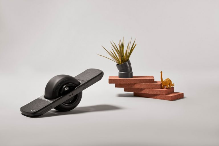 onewheel pint is a mini, portable one-wheeled skateboard for novices